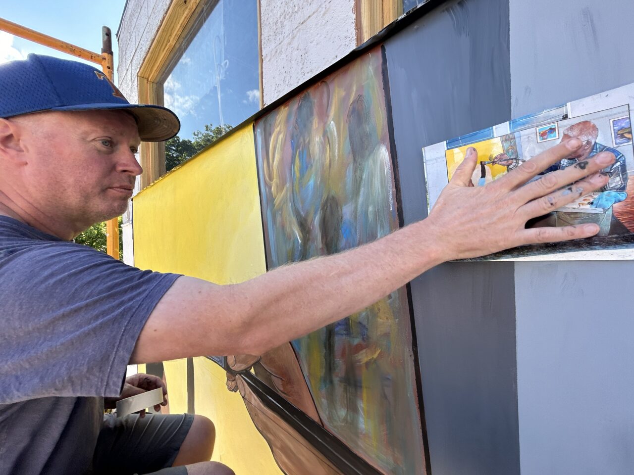 WATCH: Artist Bill Harris takes last looks at the Johnny Johnson mural ...