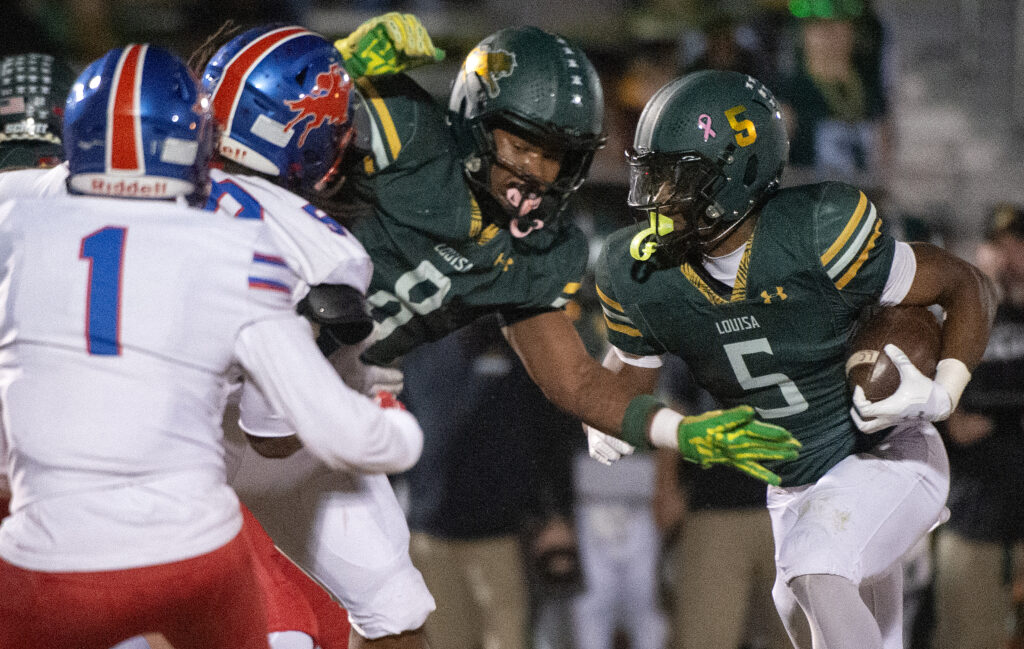 PHOTOS: Caroline football falls to Louisa in playoff opener ...